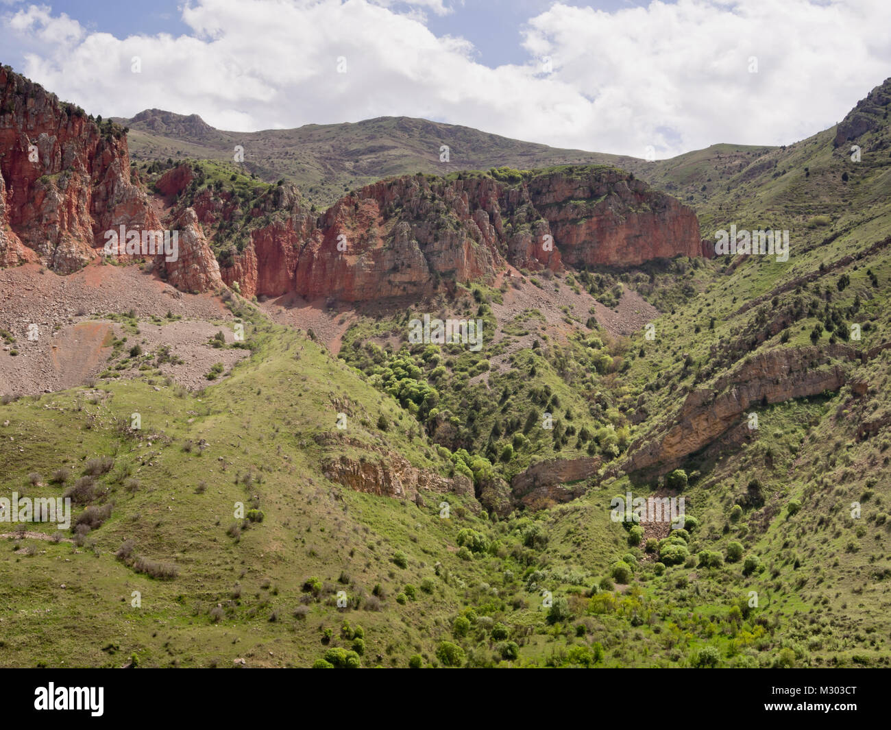 The deep and long Zangezur gorge with brick red cliffs is leading ...