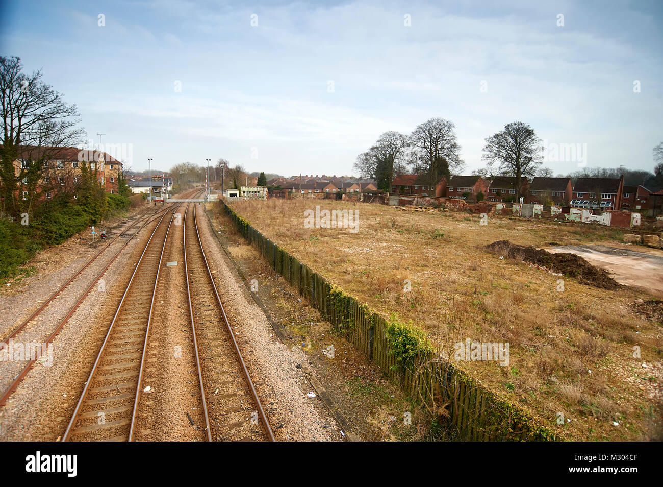 Brown Field Railway side development Stock Photo - Alamy