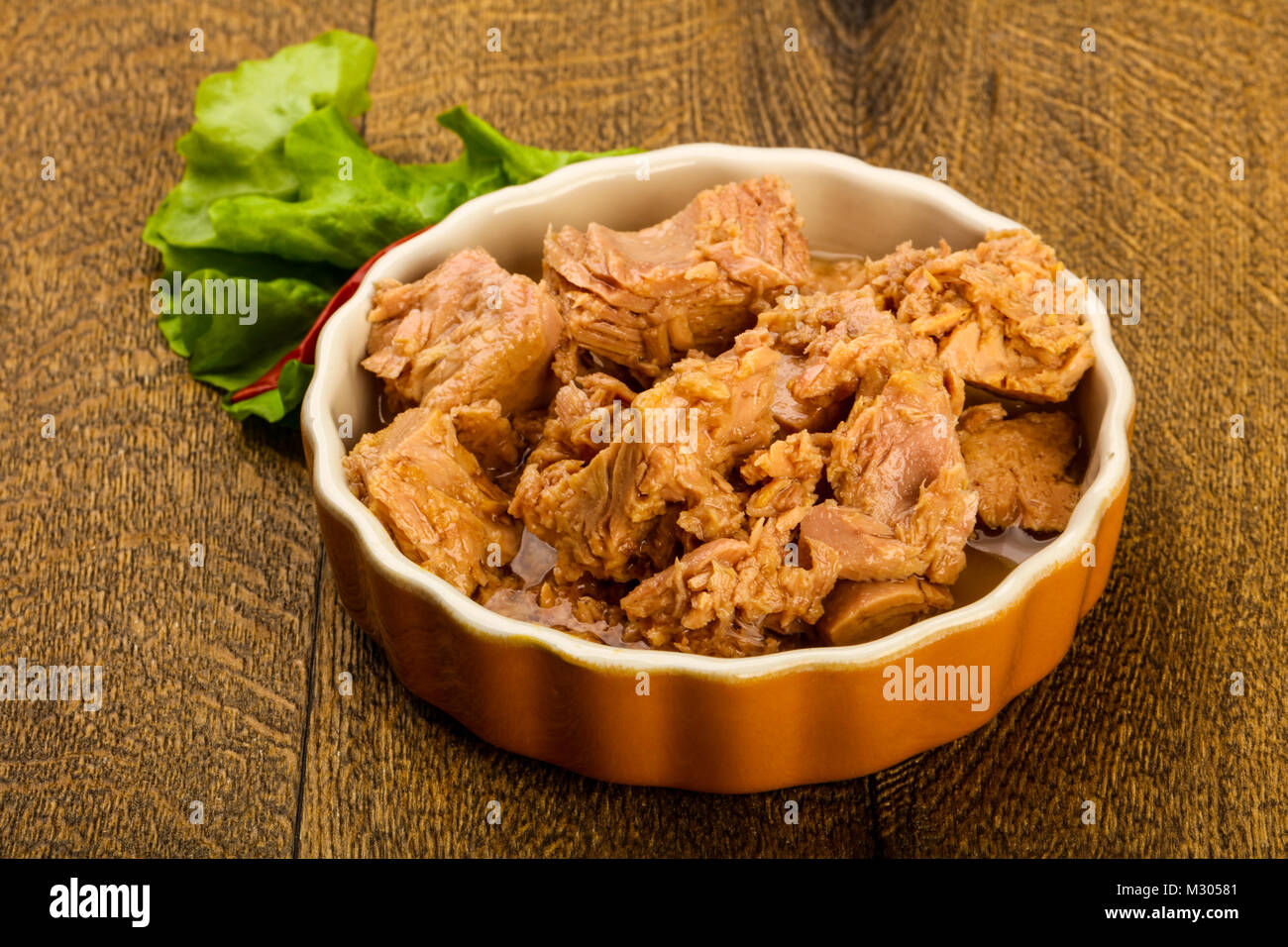 Canned tuna fish in the bowl ready for cooking Stock Photo - Alamy