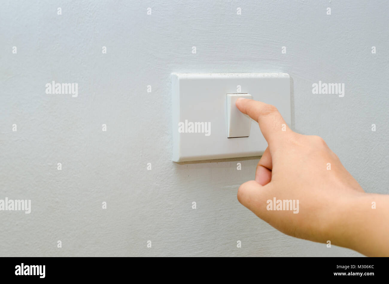 Womans hand light switch High Resolution Stock Photography and Images ...