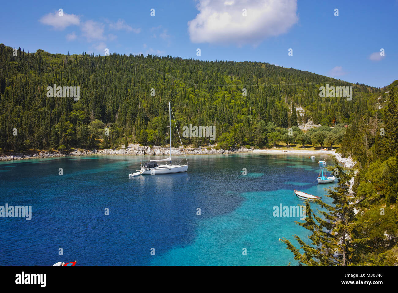 Blue waters of Foki Fiskardo Beach, Kefalonia, Ionian islands, Greece ...