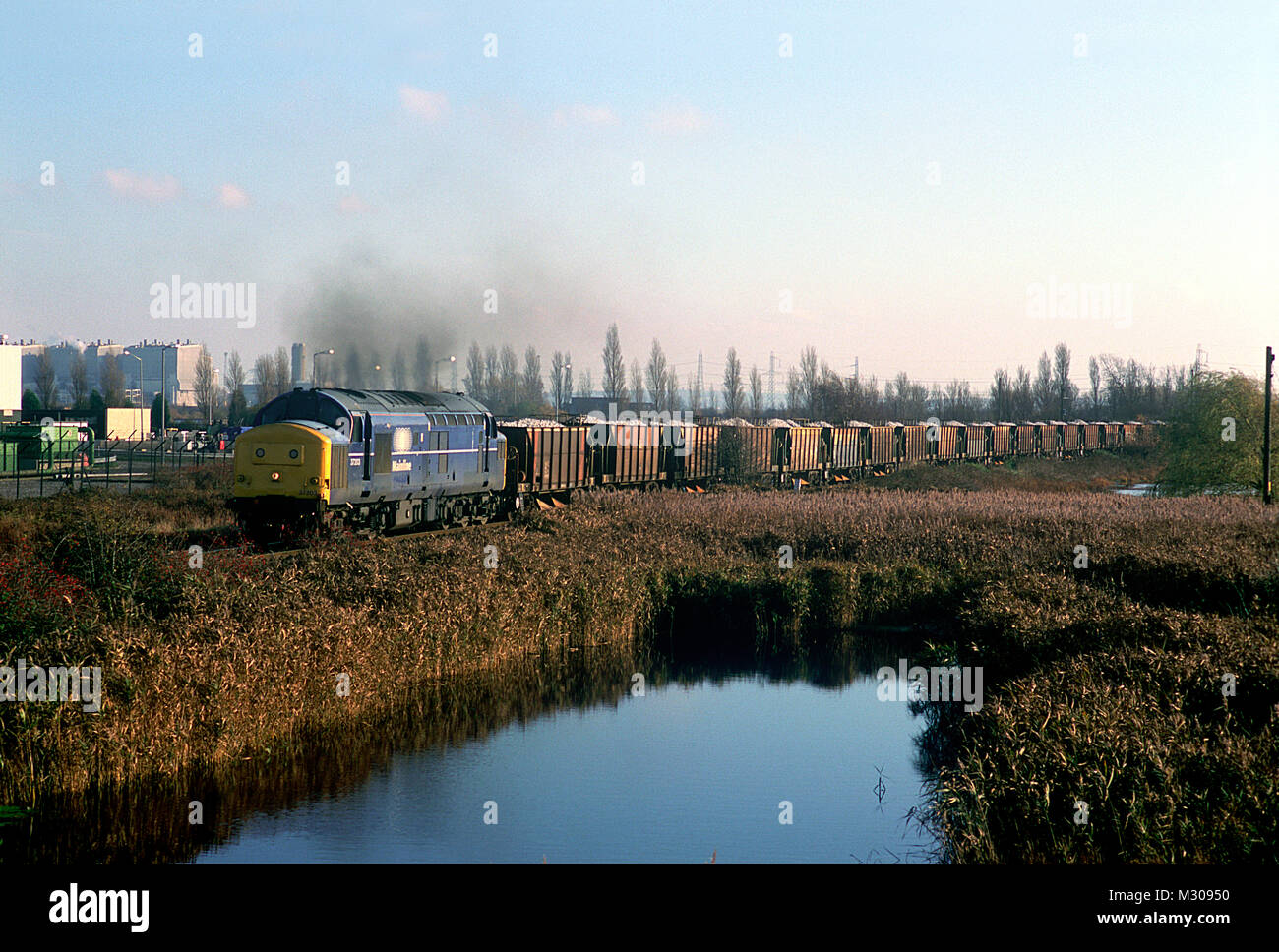 A class 37 diesel locomotive number 37203 in Mainline blue livery ...