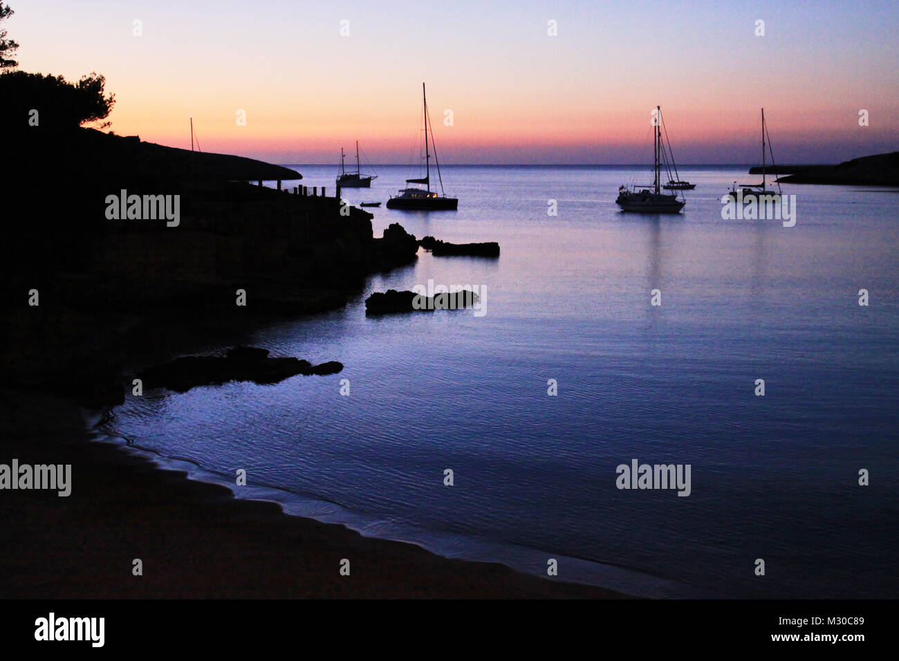 Portinatx beach ibiza sunset hi-res stock photography and images - Alamy