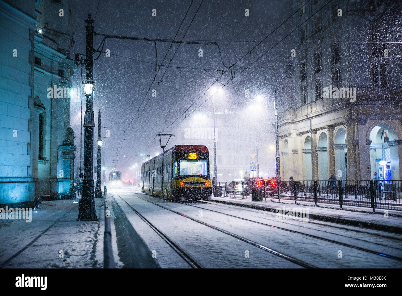 Severe powerful snow in Warsaw. One snowy winter night in the city ...