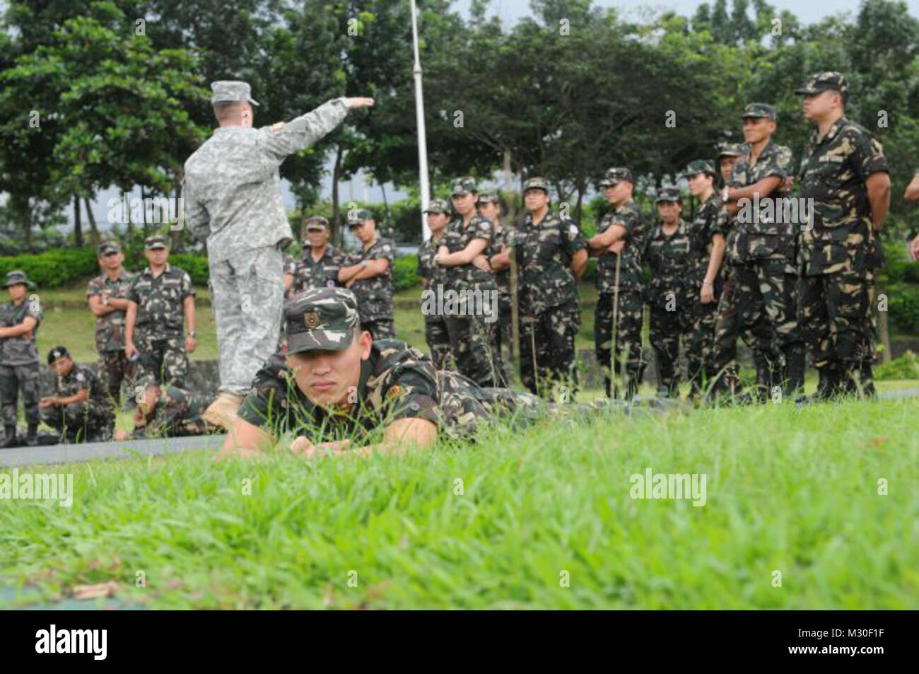 Philippine Army holds his position in a halted wedge formation ...