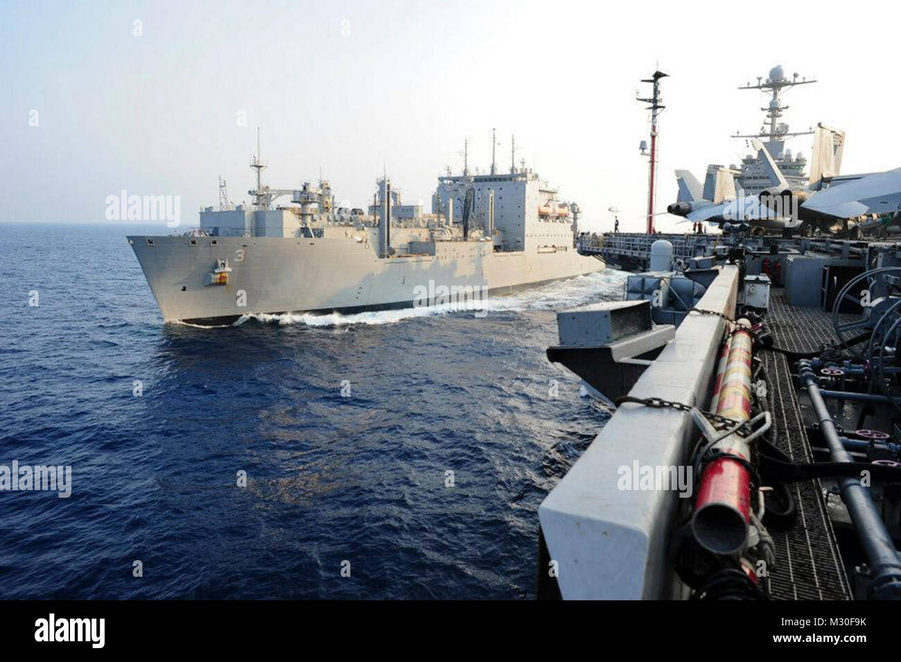 The Military Sealift Command dry cargo and ammunition ship USNS Alan ...