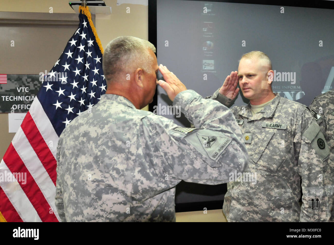 Lt. Col Roger McNabb slautes Brig. Gen. Bud R. Jameson Jr., commander ...