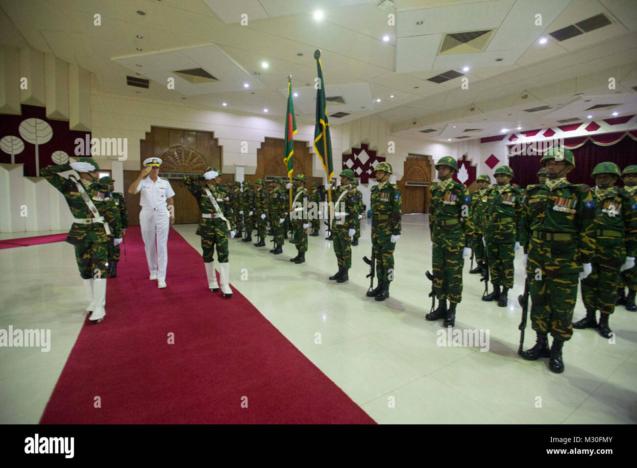 Adm. Samuel J Locklear III is escorted by Bangladesh military personnel ...