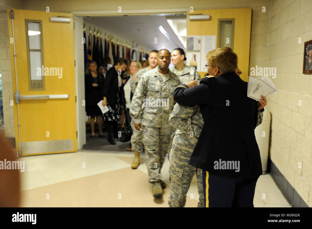 Col. Cynthia A. Millonzi receives congratulations from friends and ...