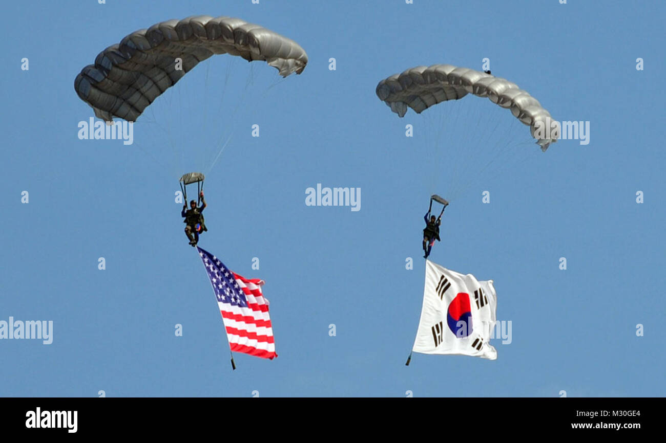 Parachute Demo Team descend with the American and ROK flags by #PACOM ...