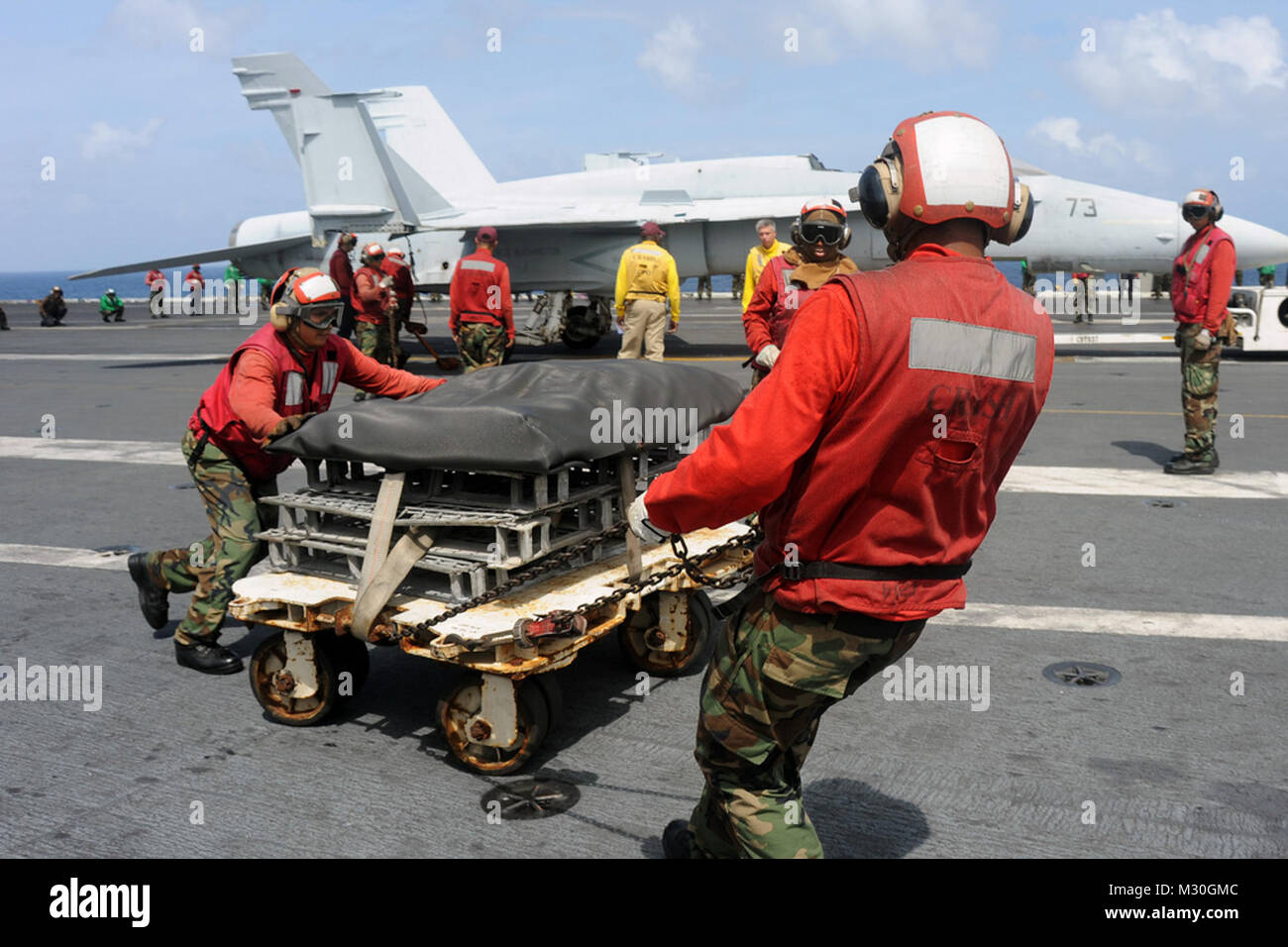 Sailors move and stow gear after flight deck drills by #PACOM Stock ...