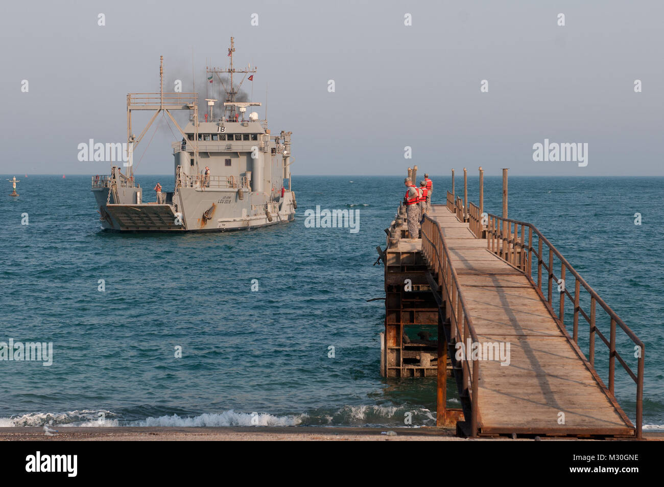 LCU 2018 Dropping Ramp and Docking at Kuwaiti Naval Base by 316th ESC ...