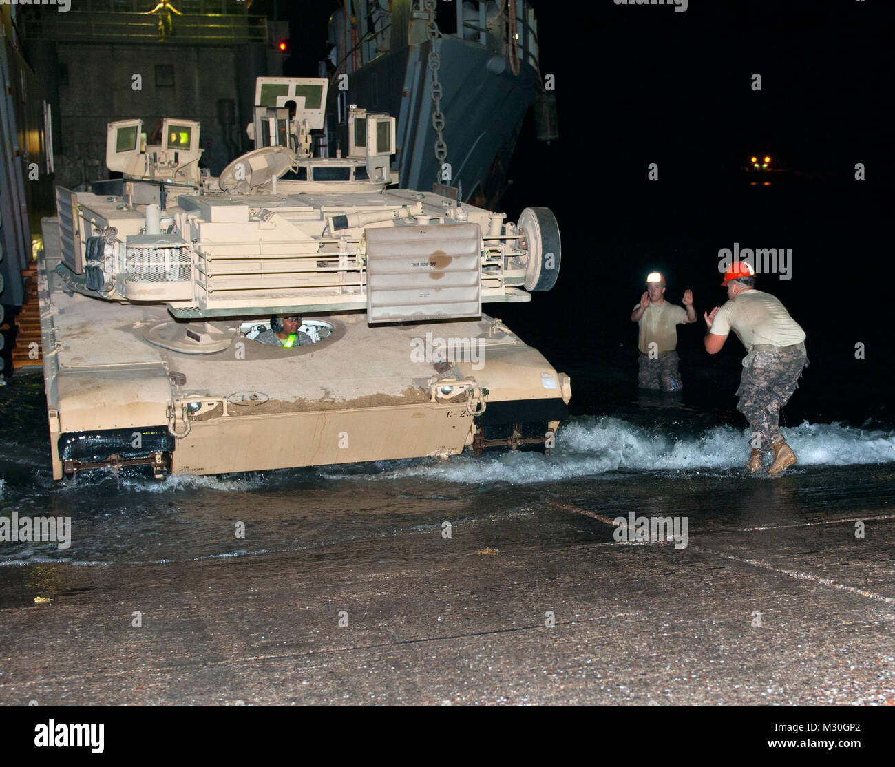 316th Soldiers Observing the Loading of Tanks Onto a Boat by 316th ESC ...