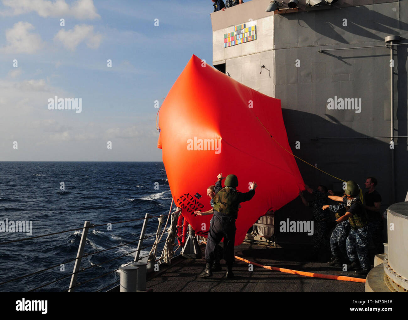 Launch an inflatable 'killer tomato' target in preparation for weapons ...