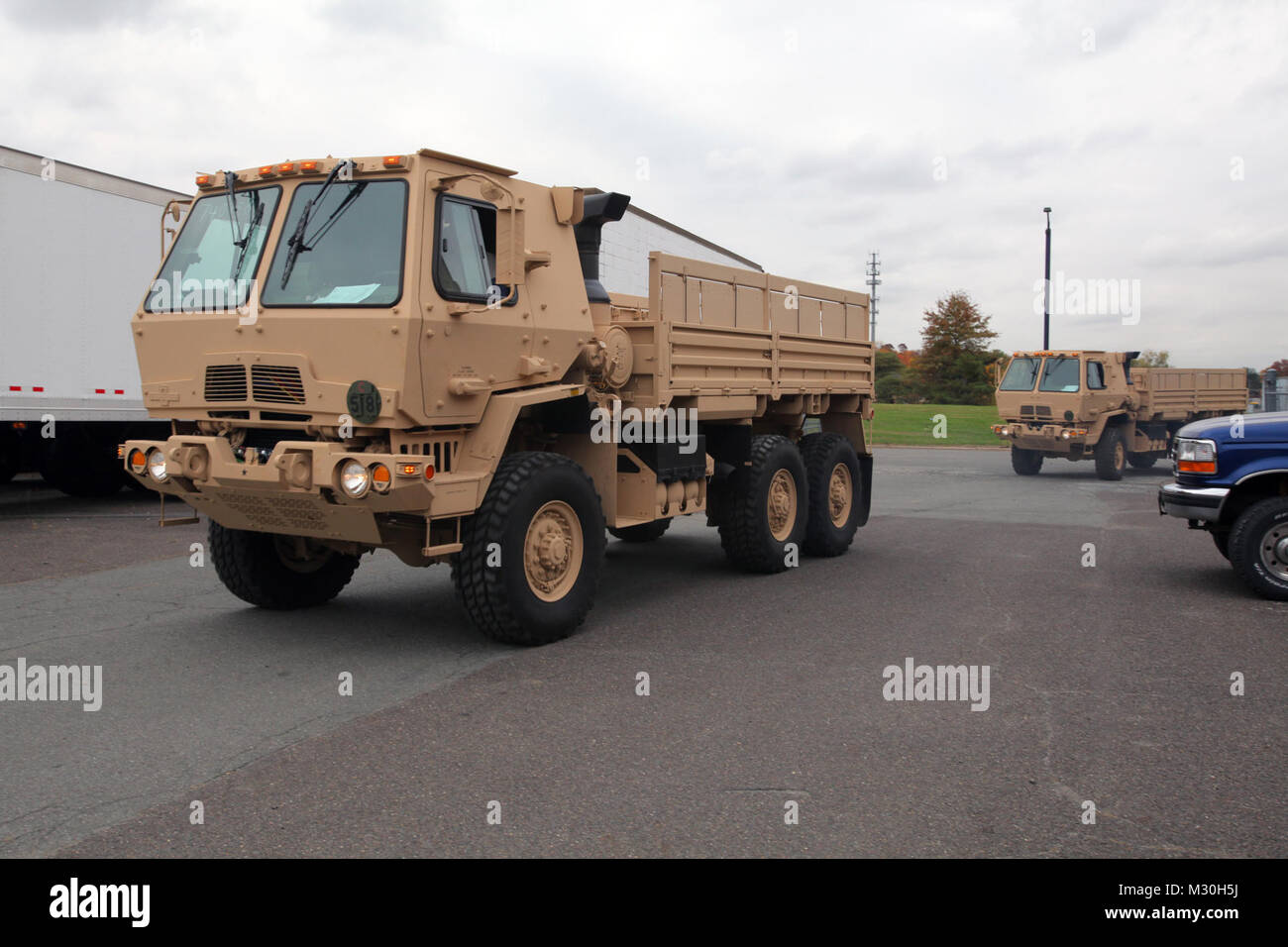 Medium tactical vehicles with the New Jersey Army National Guard are ...