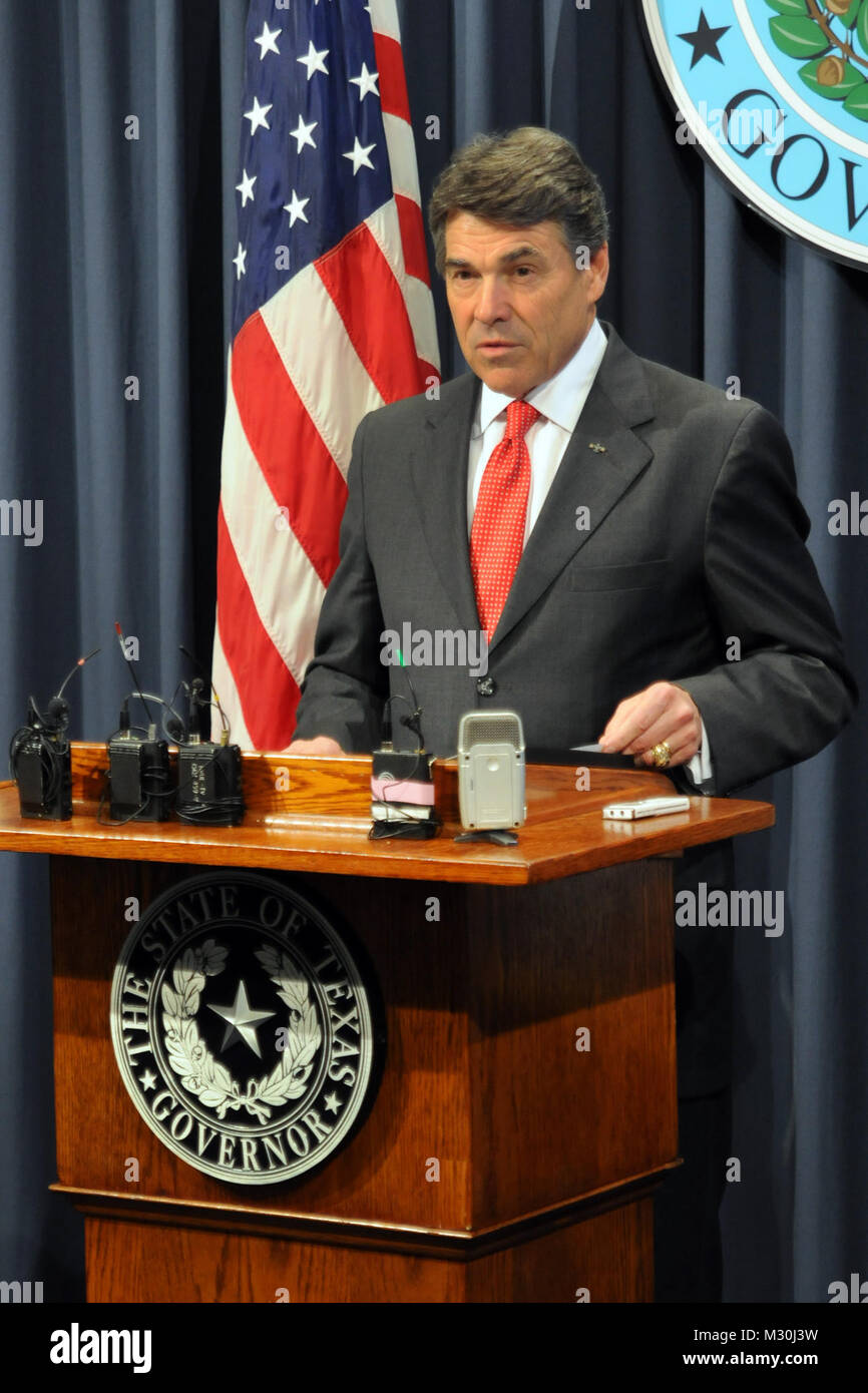Texas Gov. Rick Perry makes remarks before presenting the Purple Heart ...