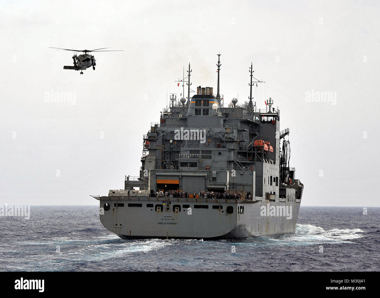 A vertical replenishment at sea with ships from the George Washington ...