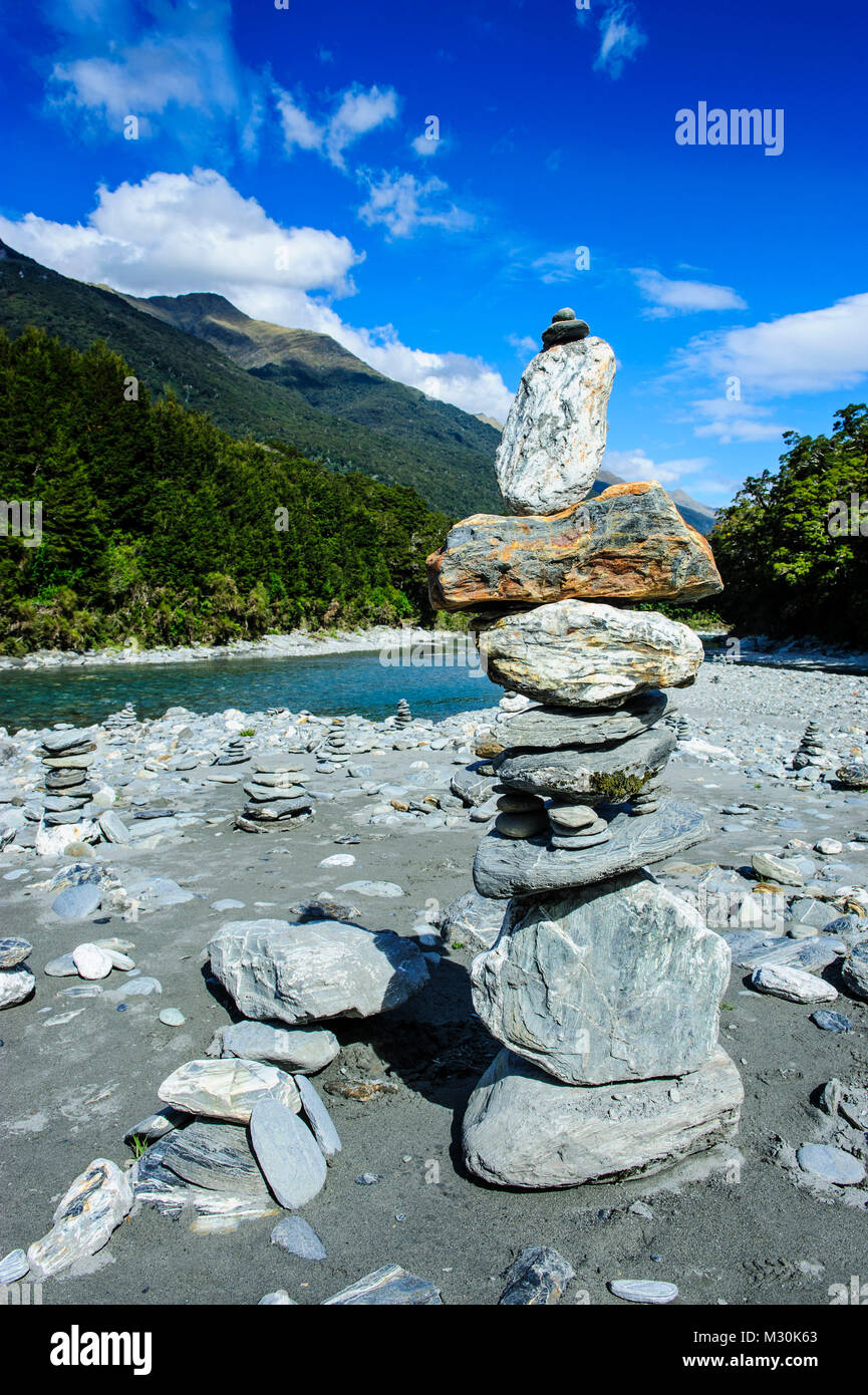 Man made stone pyramids at the Blue Pools, Haast Pass, South Island ...
