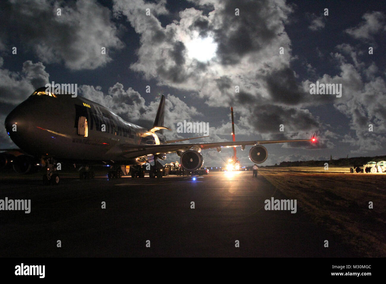 Boeing 747-400 aircraft is unloaded during Exercise Forager Fury 2012 ...