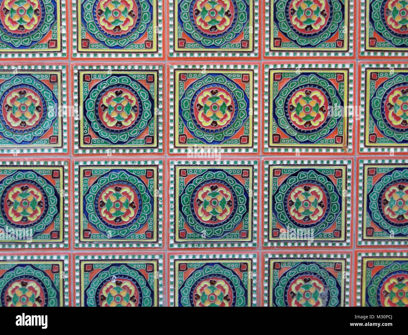 Colourful ceramic tiles decorate this wall here in Georgetown, Malaysia ...