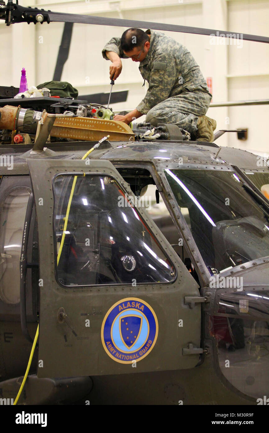 Black Hawk mechanic by The National Guard Stock Photo - Alamy