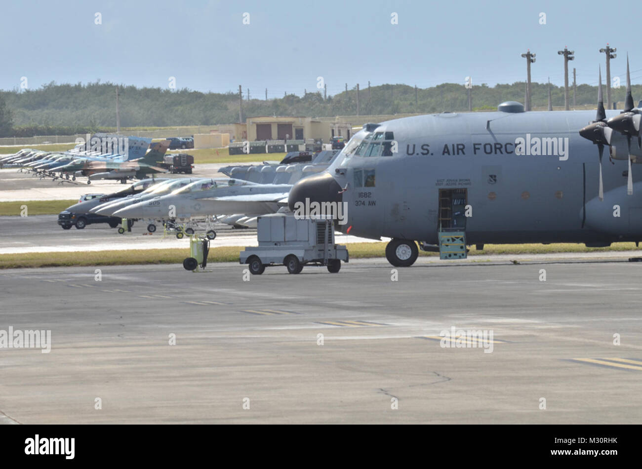U.S Air Force and Navy aircraft are parked on the Andersen Air Force ...