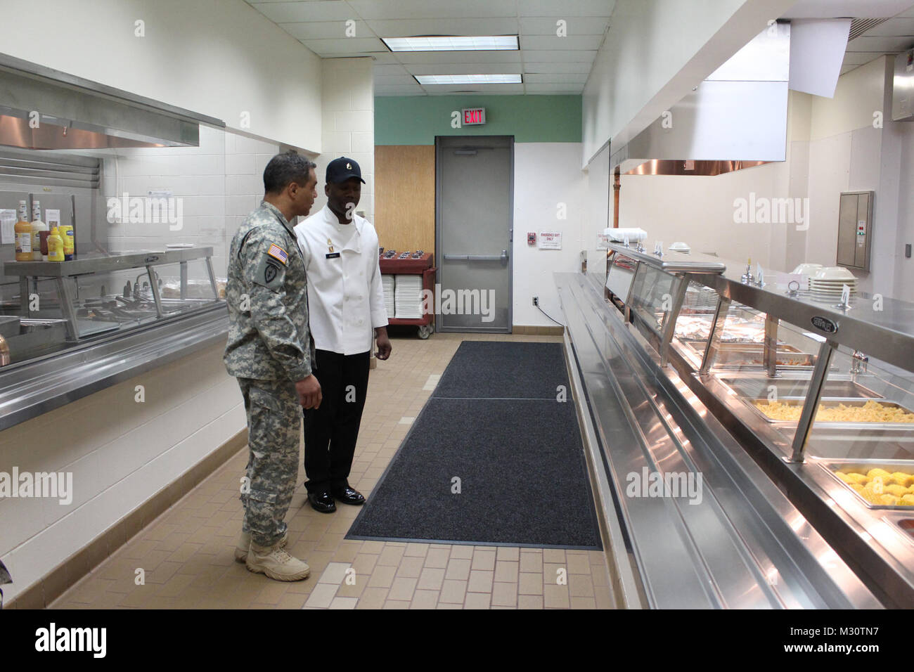 Dining Facility Manager Sgt. 1st Class Andrew Propes gives Maj. Gen ...
