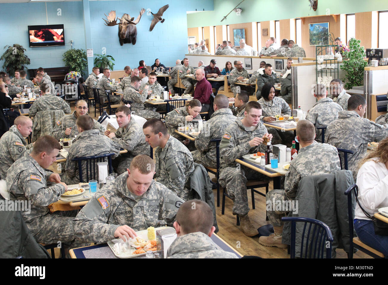 Fort Wainwright Soldiers enjoy lunch during the opening ceremony of the ...