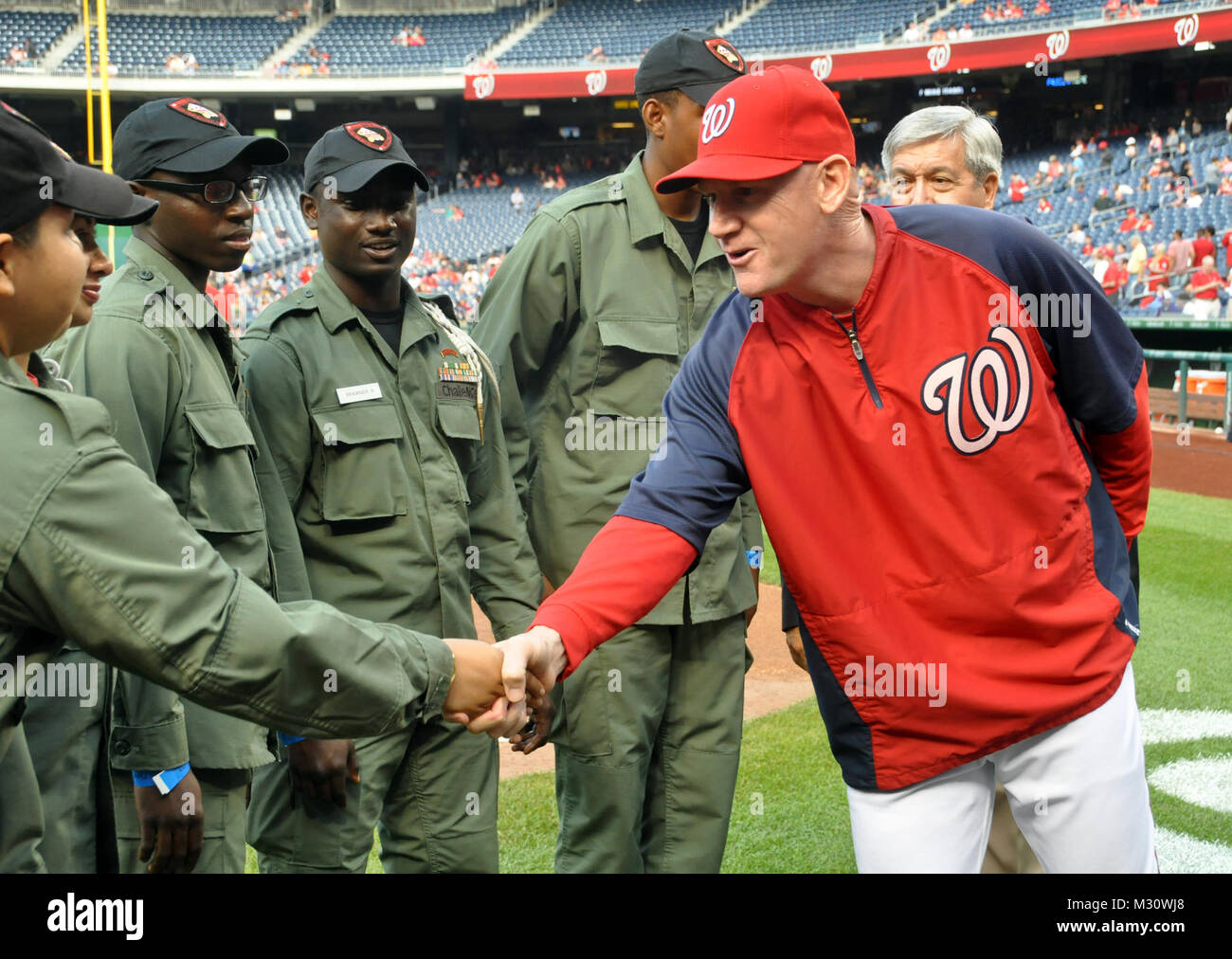 Nationals Manager Davey Johnson shakes hands with CGYCA Cadets. by ...
