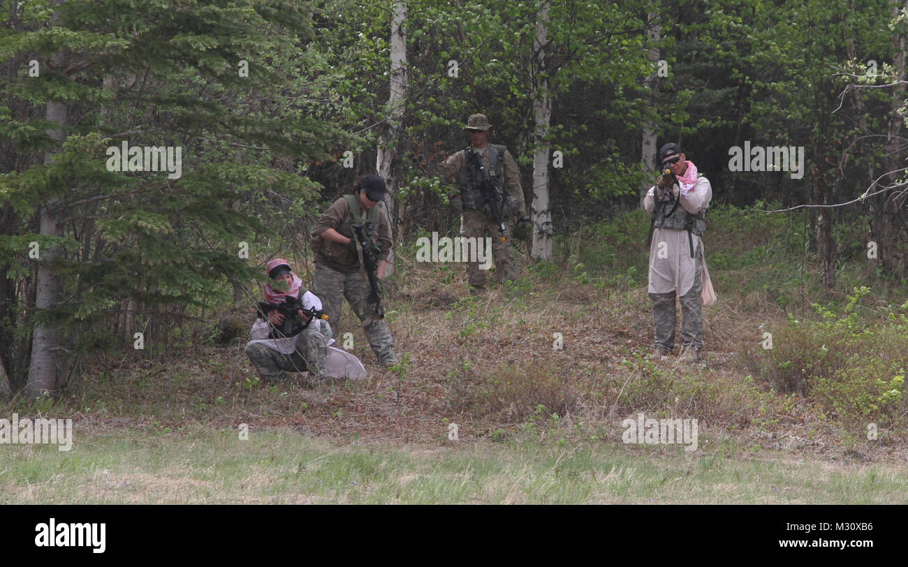 oldiers from the Brigade Support Battalion act as the opposing force ...