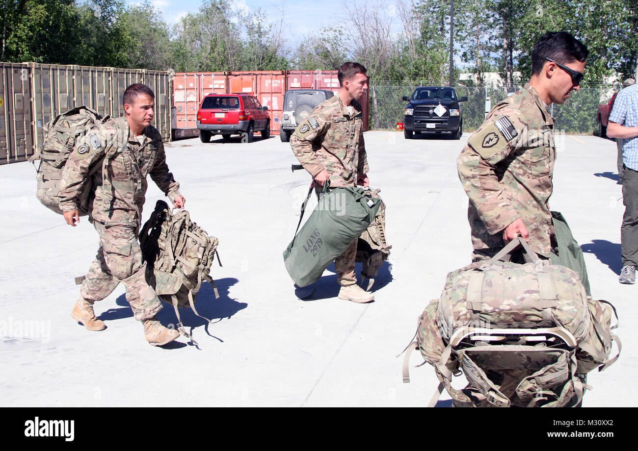 Soldiers from 65th Explosive Ordnance Disposal Company collect their ...