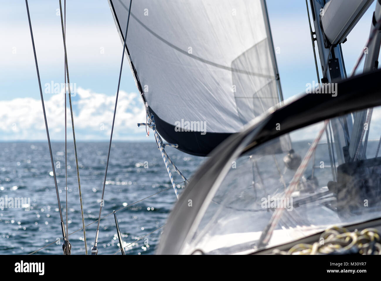 sails of a sailing yacht in the wind sailing on the ocean Stock Photo ...