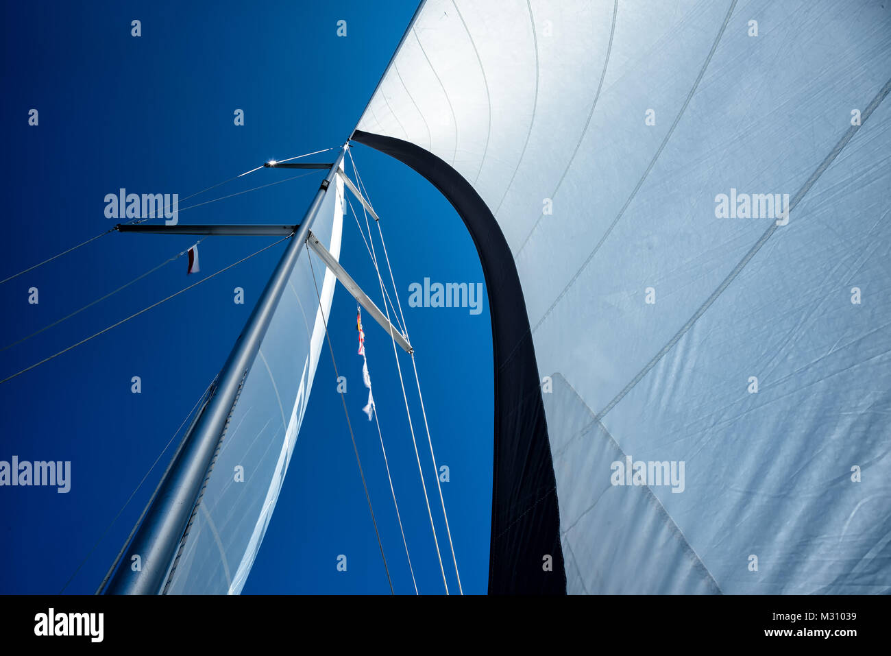 sails of a sailing yacht in the wind sailing on the ocean Stock Photo ...