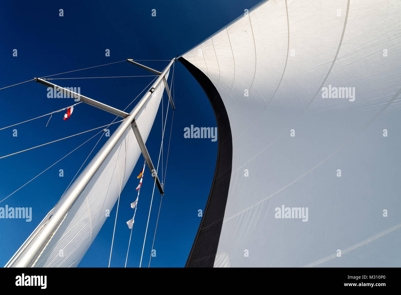 sails of a sailing yacht in the wind sailing on the ocean Stock Photo ...