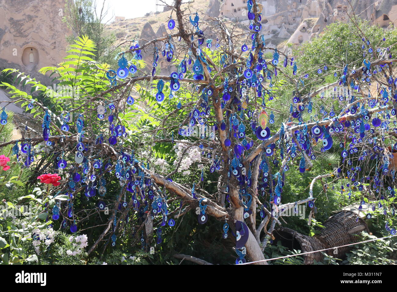 Turkish eyes hanging from a tree in Cappadocia Stock Photo - Alamy