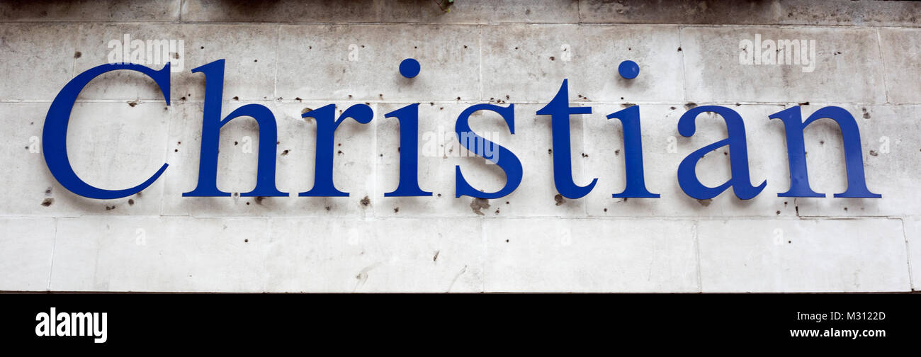 A sign in blue reading "Christian" on a light stone background Stock ...