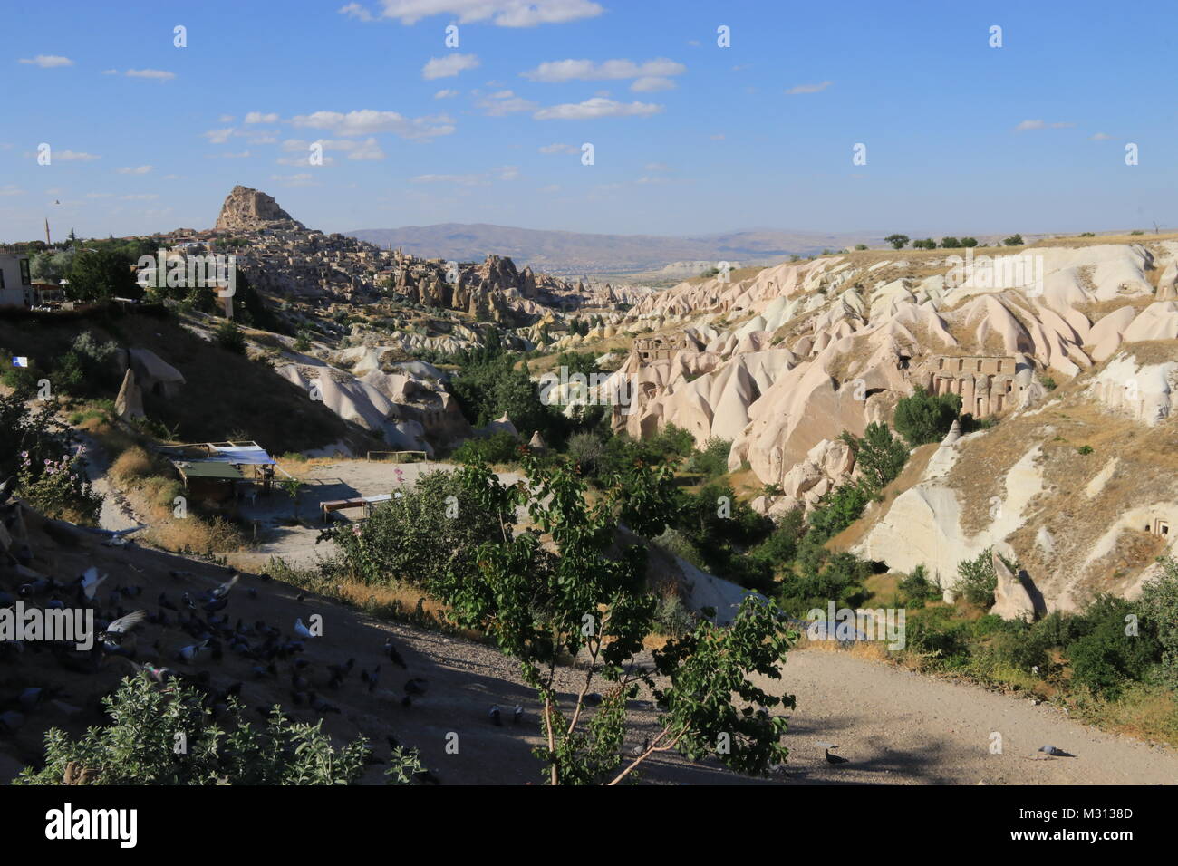 Tourists visiting some of the famous Fairy chimneys in Cappadocia which ...