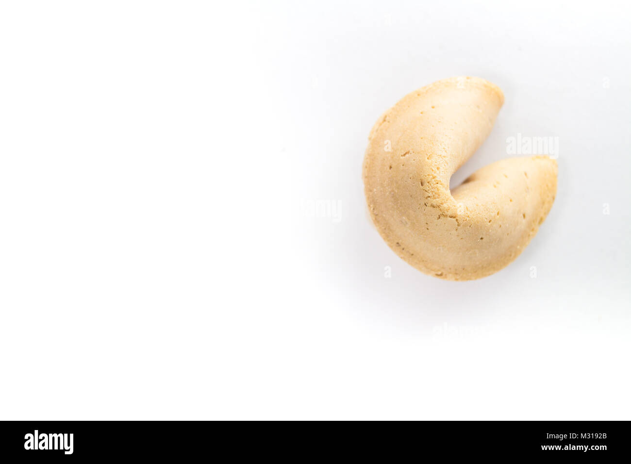 Fortune cookie isolated on white background top view Stock Photo - Alamy