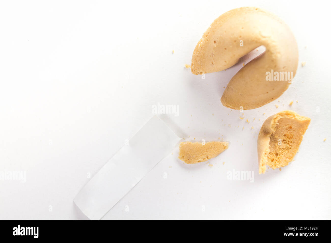 Fortune cookie isolated on white, cracked with message paper Stock ...