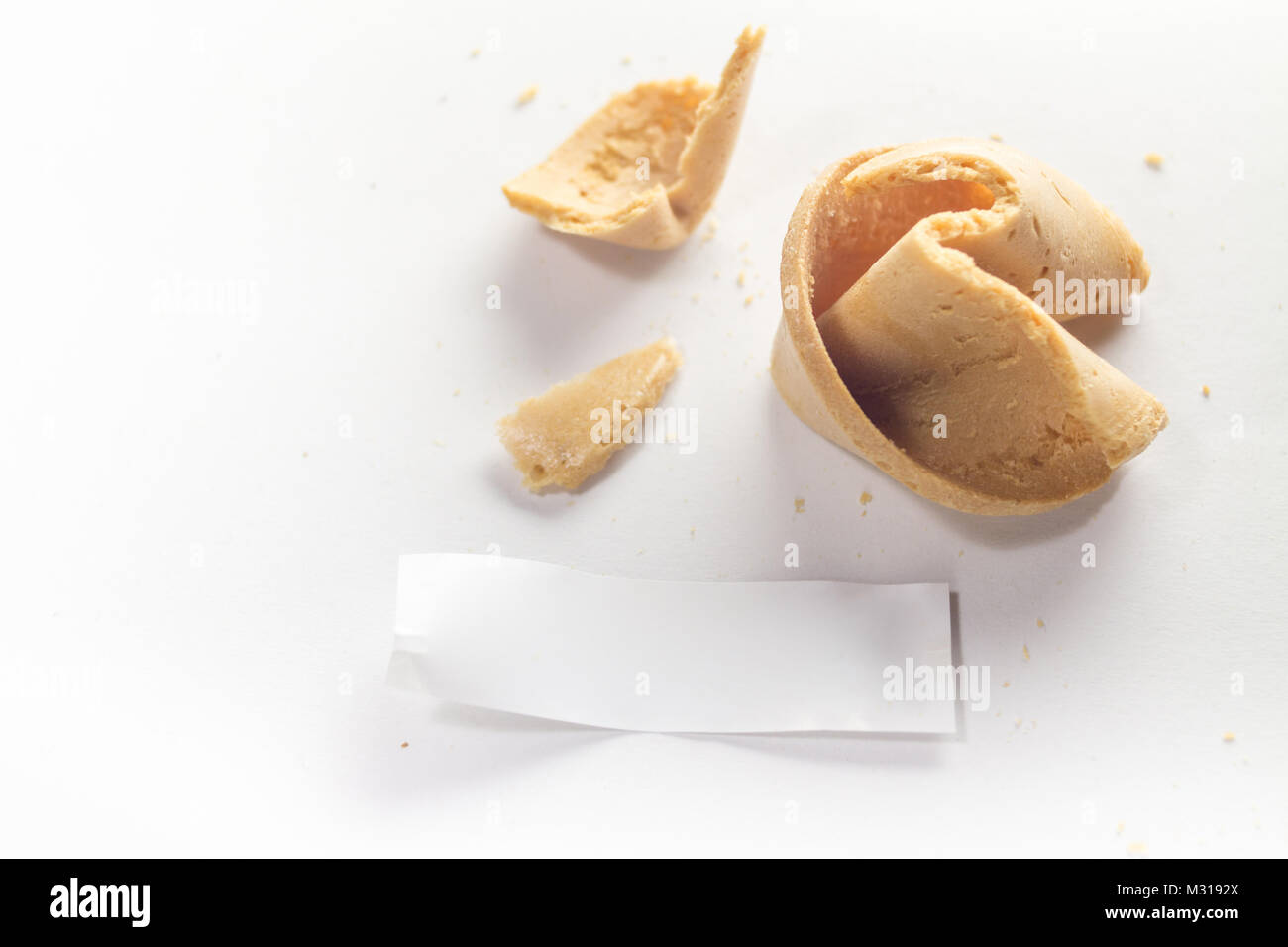 Fortune cookie isolated on white, cracked with message paper Stock ...