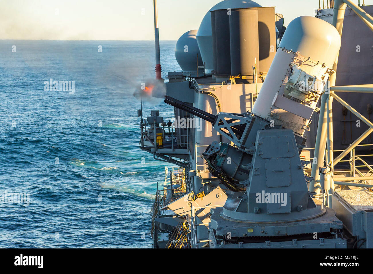 A Close In Weapons System (CIWS) fires at a simulated target during a ...