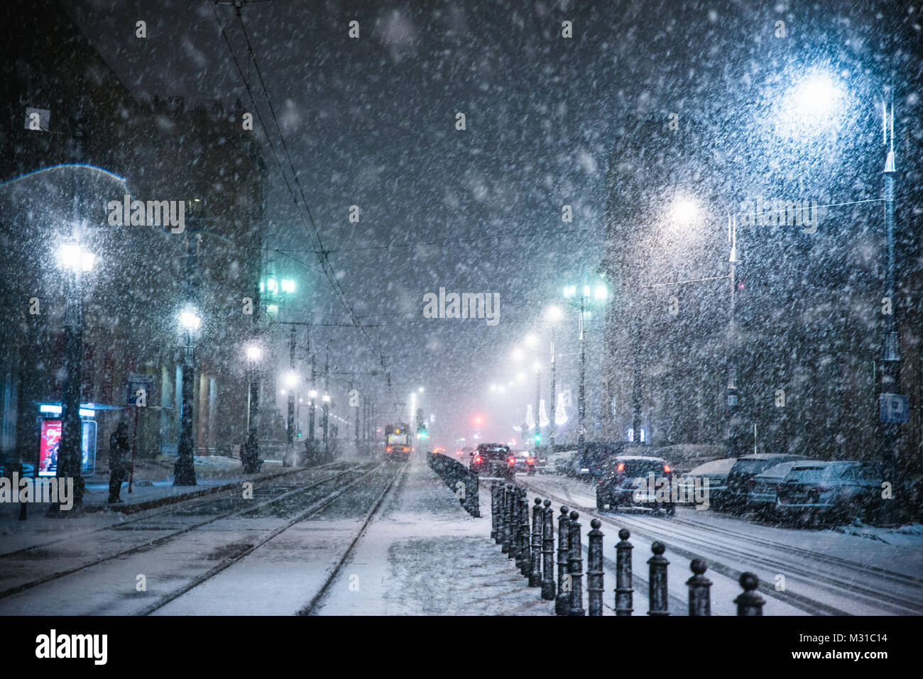 Severe powerful snow in Warsaw. One snowy winter night in the city ...