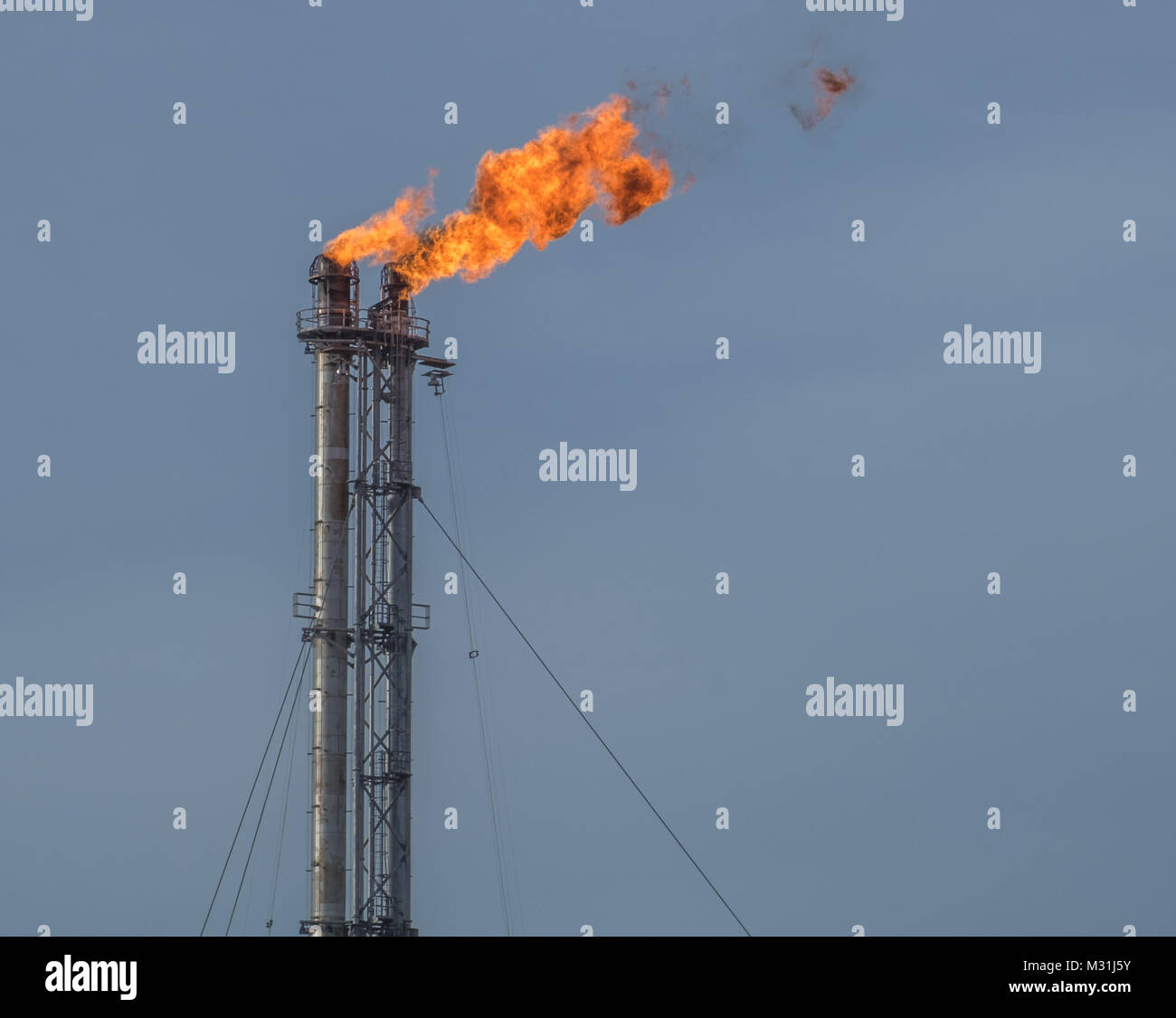 Flare stack at petroleum refinery in Port Arthur Texas Stock Photo - Alamy