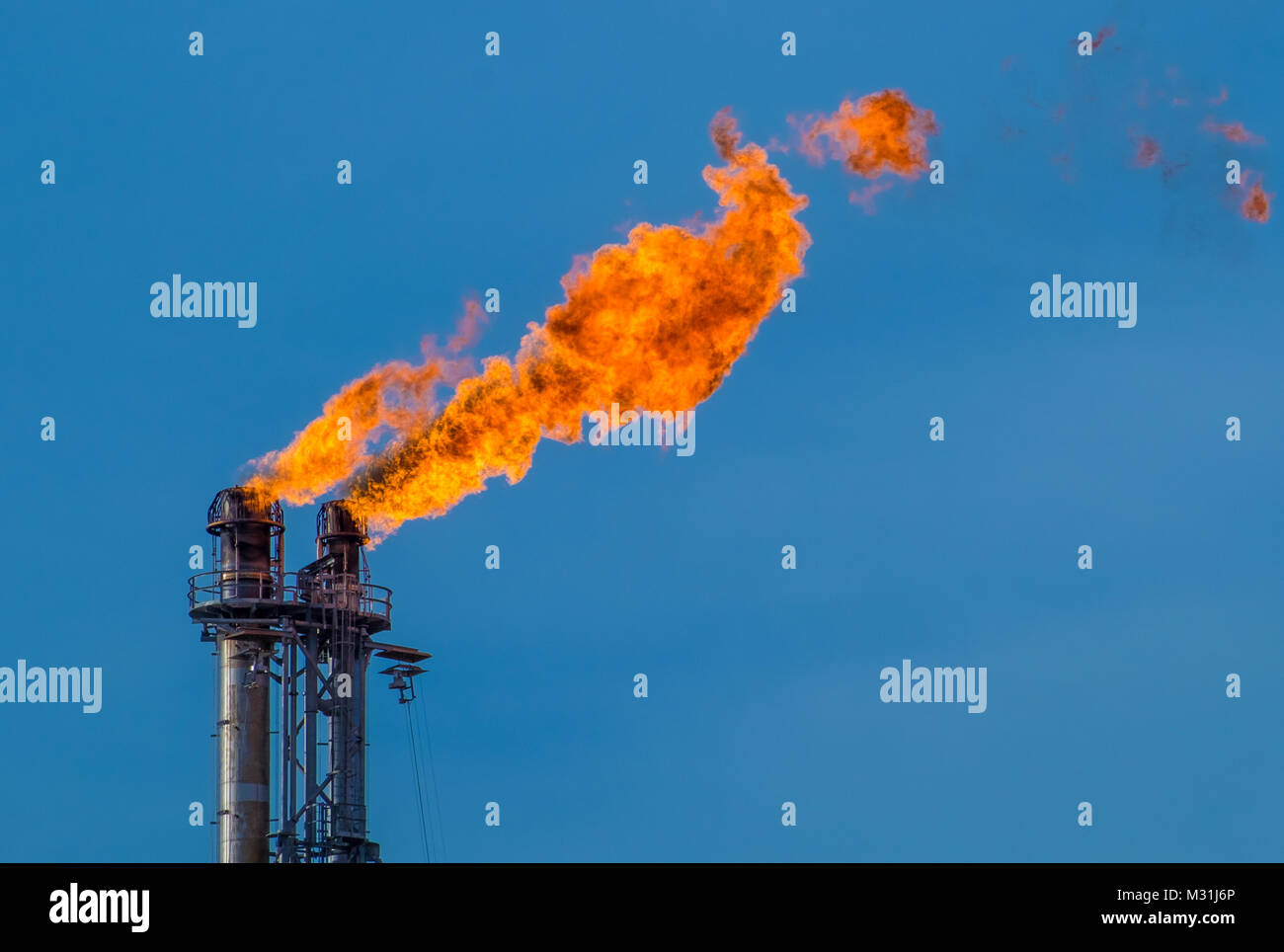Flare stack at petroleum refinery in Port Arthur Texas Stock Photo - Alamy