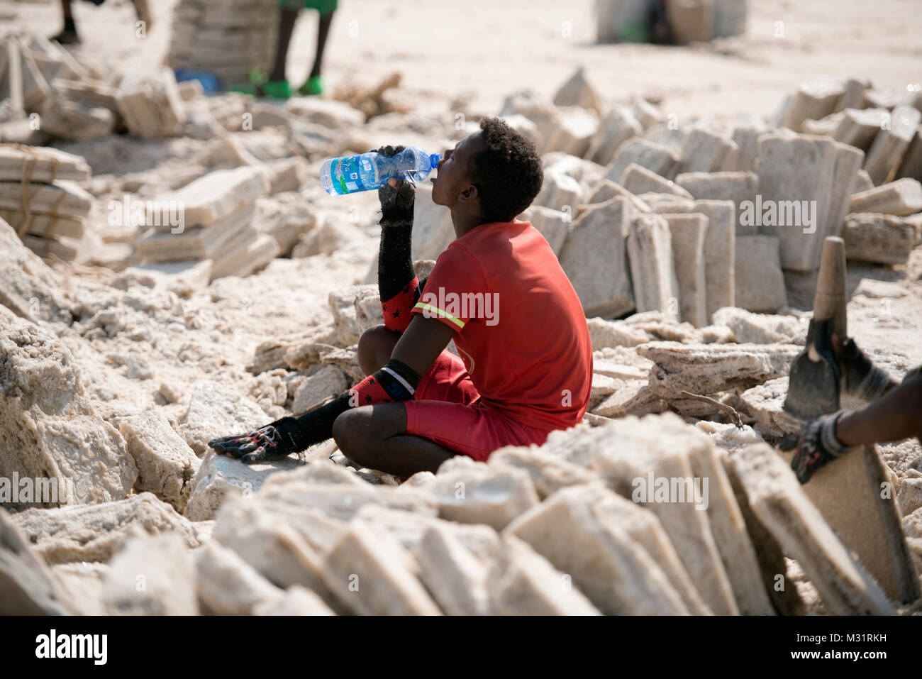 Harsh labor conditions hi-res stock photography and images - Alamy