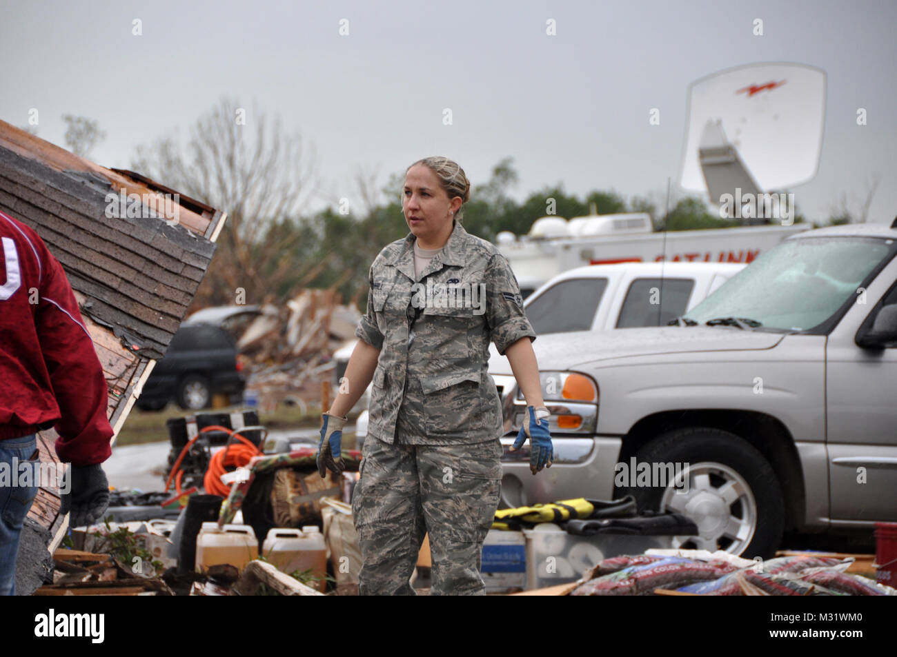Airman 1st Class Tracy Barnhill, 137th Maintenance Group surveys the ...
