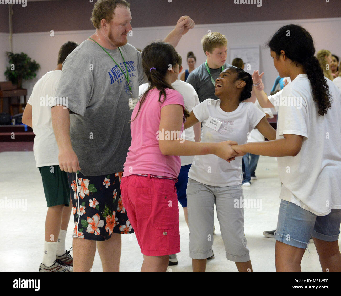 Camp staff member Anthony Bryson, a student at Angelo State University ...