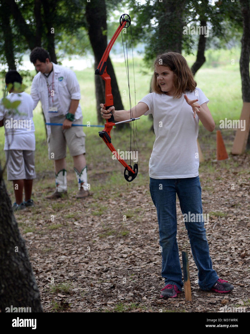 Madison Keith, 11, of Brownwood, fires an arrow during the 3D archery ...