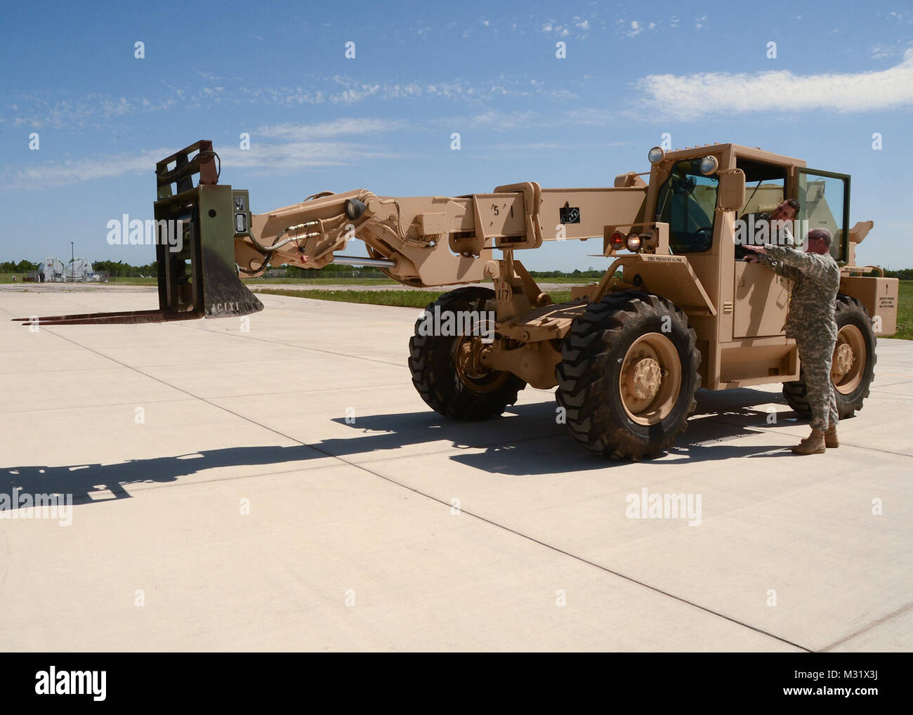 Chief Warrant Officer 4 Kelly Cawood, of Goldsby, Okla., a member of ...