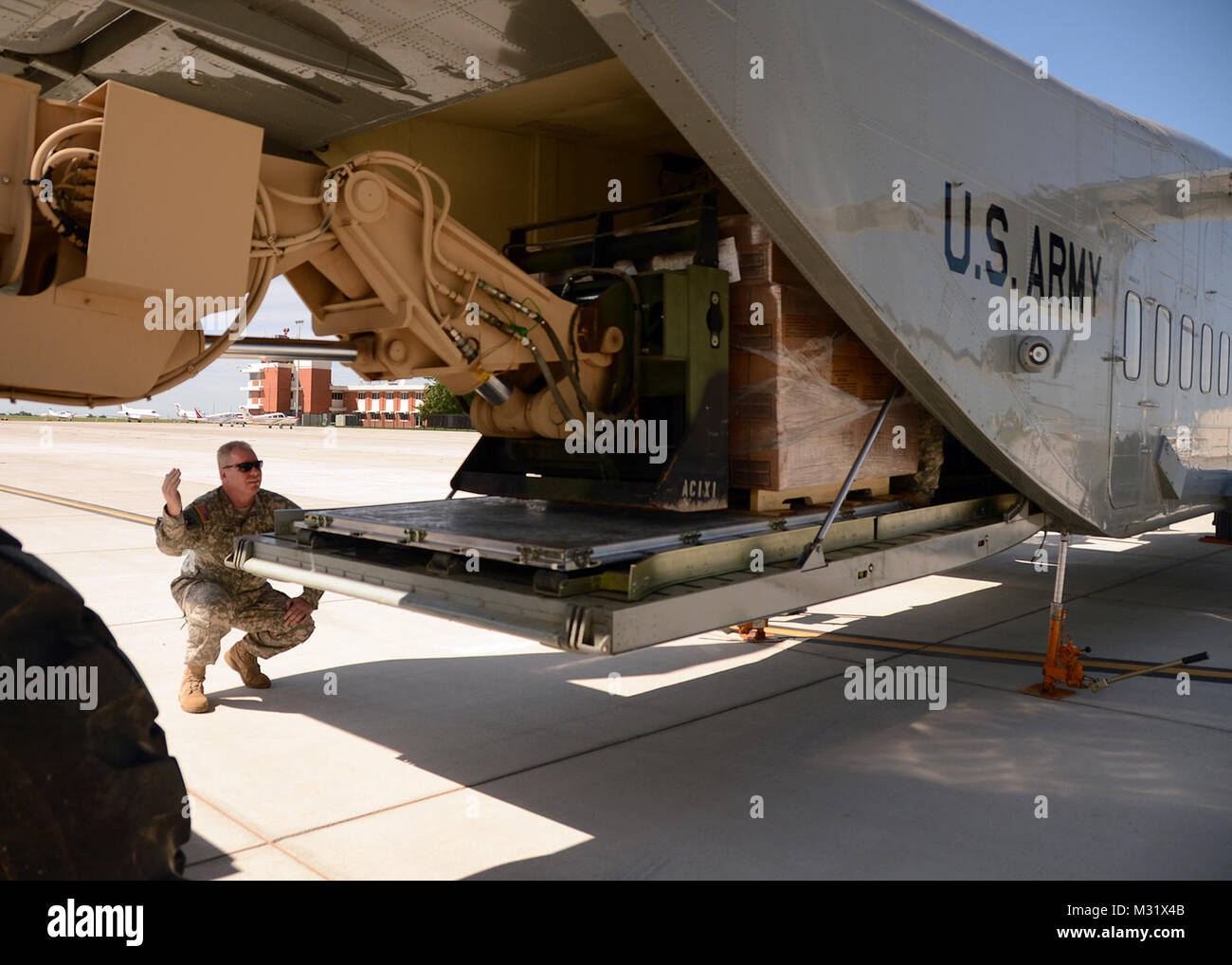 Chief Warrant Officer 4 Kelly Cawood, of Goldsby, Okla., a member of ...